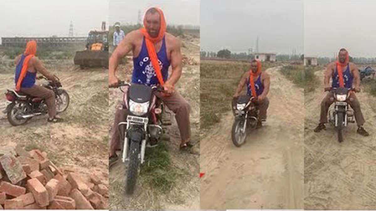 Great Khali Rides Hero HF Deluxe Bike Video: ग्रेट खली हीरो एचएफ डीलक्स ...